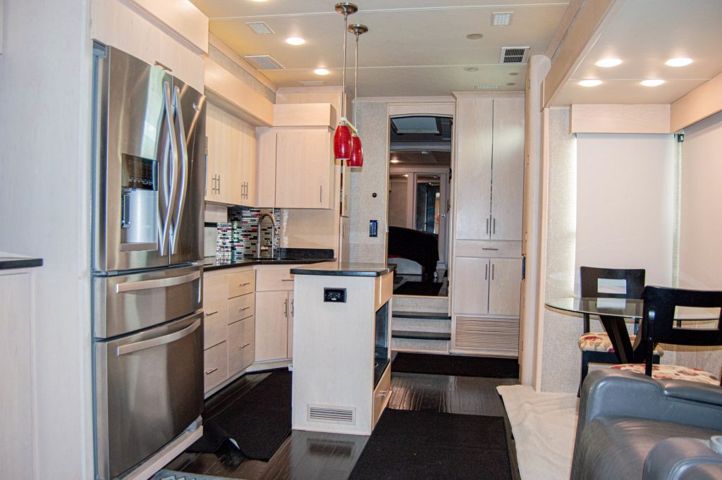 This Gigantic 48-Foot Camper Comes With Its Own Volvo Semi Truck And A ...
