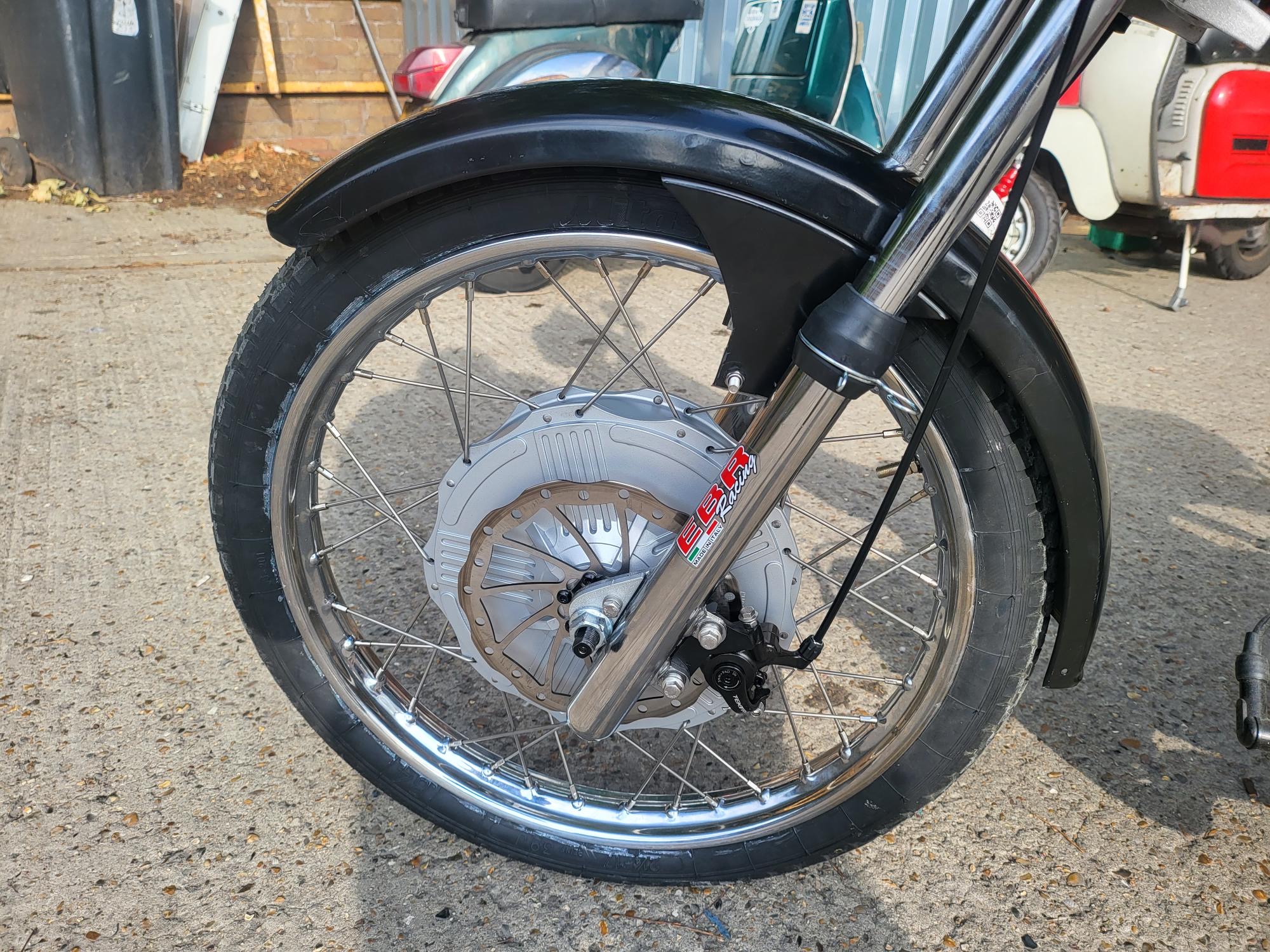 Here's What It's Like Riding A Plug-In Hybrid Two-Stroke All-Wheel ...