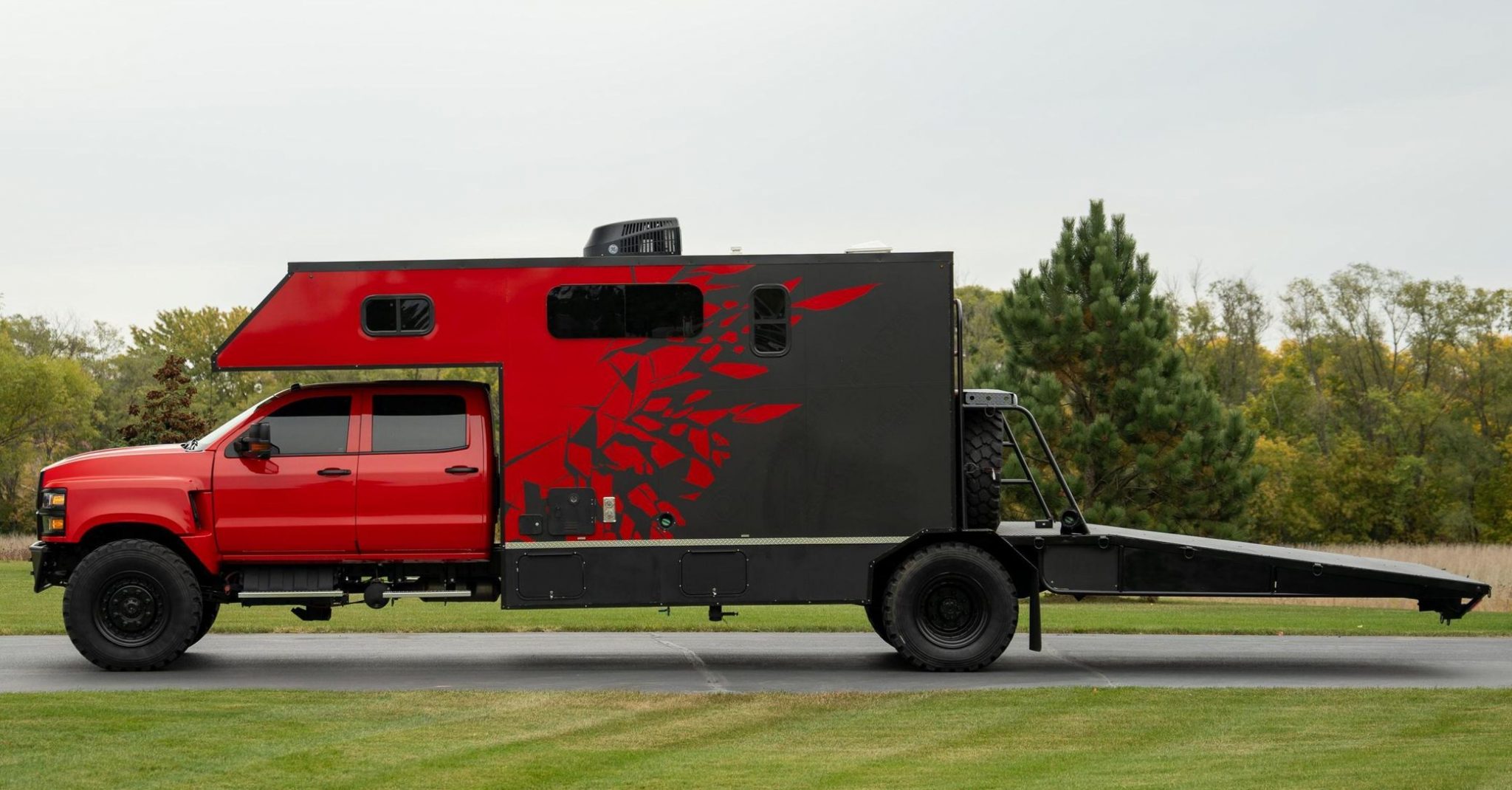 This Ridiculous RV Takes You, Your Friends, And Your Car To The Track ...