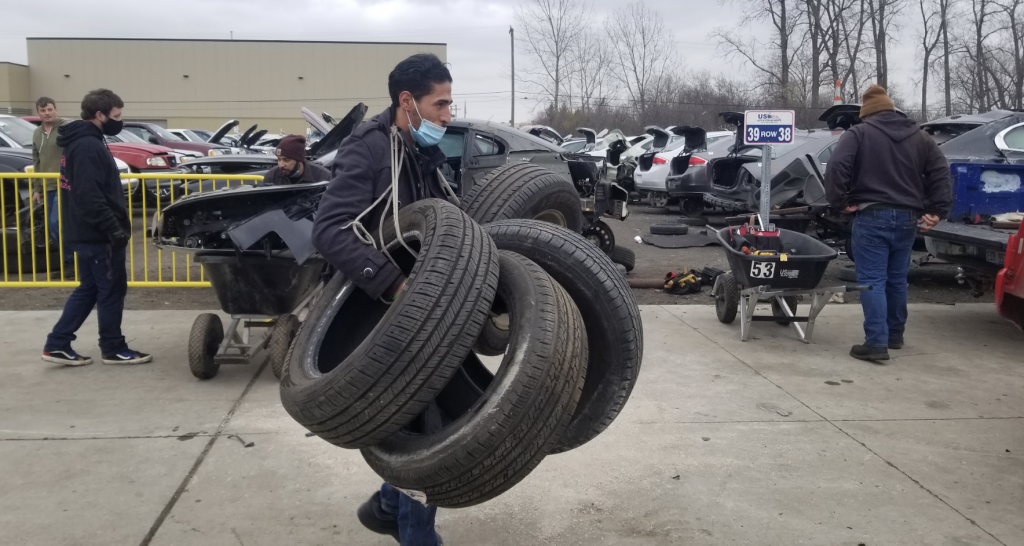Watch In Awe As These Men Carry 300 Pound Engines And 500 Pound Axles ...