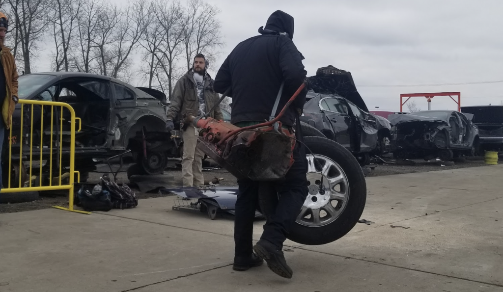 Watch In Awe As These Men Carry 300 Pound Engines And 500 Pound Axles ...