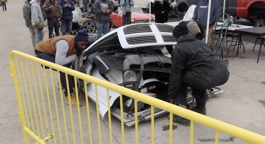 Watch In Awe As These Men Carry 300 Pound Engines And 500 Pound Axles ...