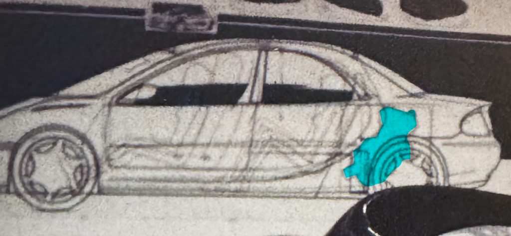 What The Hell Is This Mid-Engined Sedan On The Wall Behind A Prototype ...